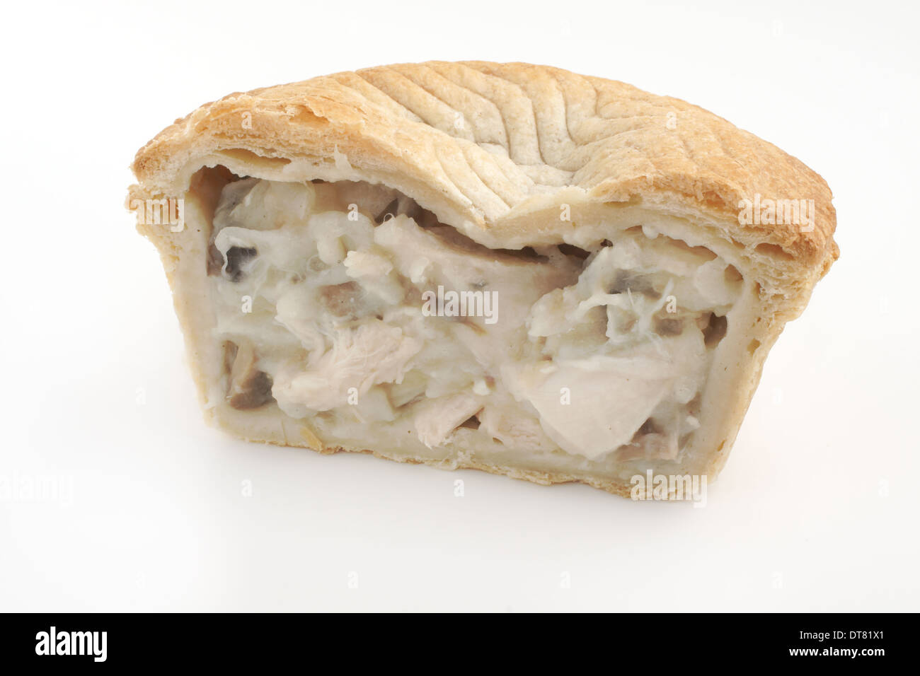 Chicken and Mushroom pot pie cut in half studio isolated Stock Photo ...
