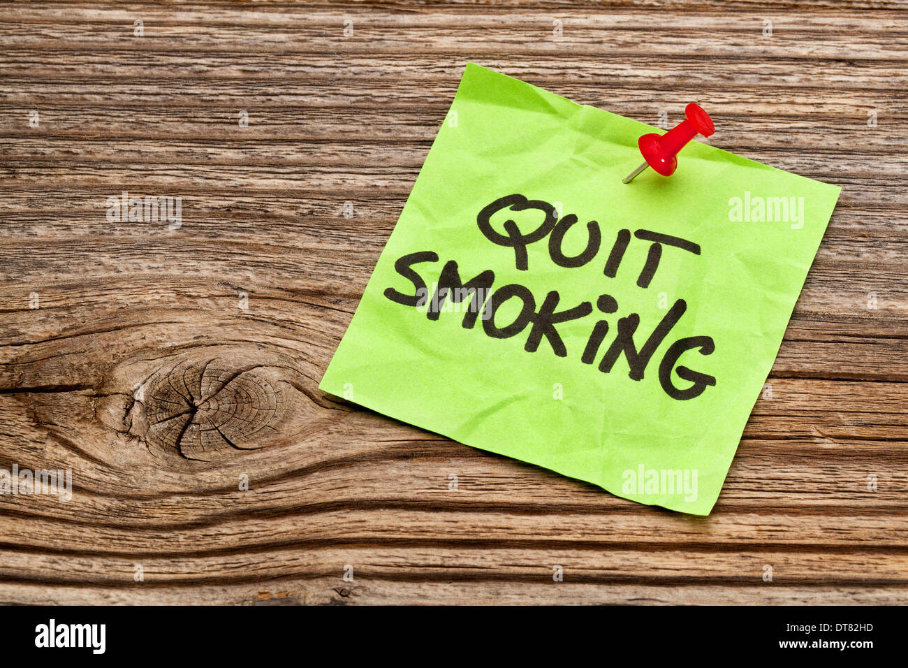 quit smoking reminder note against grained weathered wood Stock Photo ...