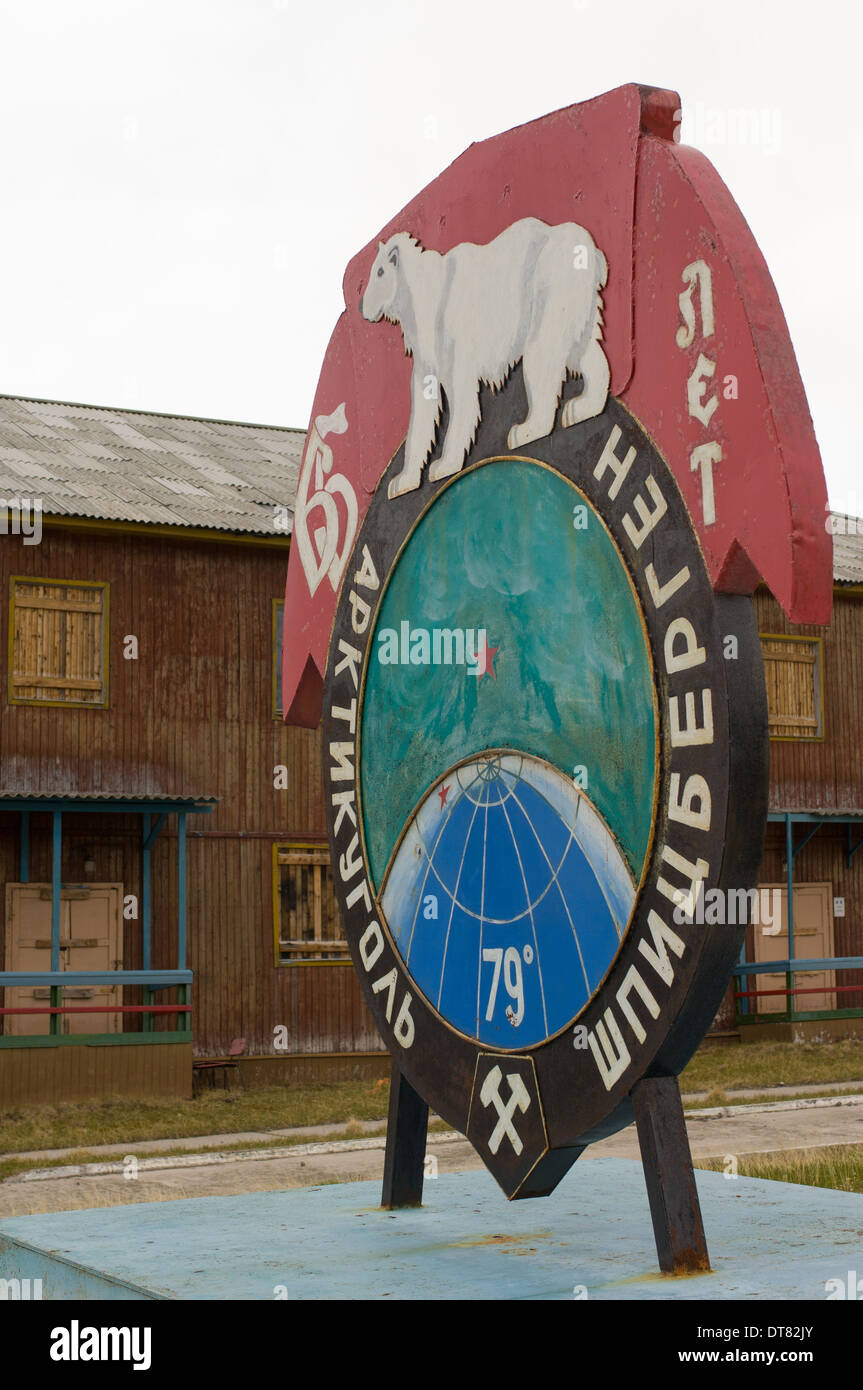 Polar bear sign in Russian Cyrillic, marking 79° north, at the deserted ...
