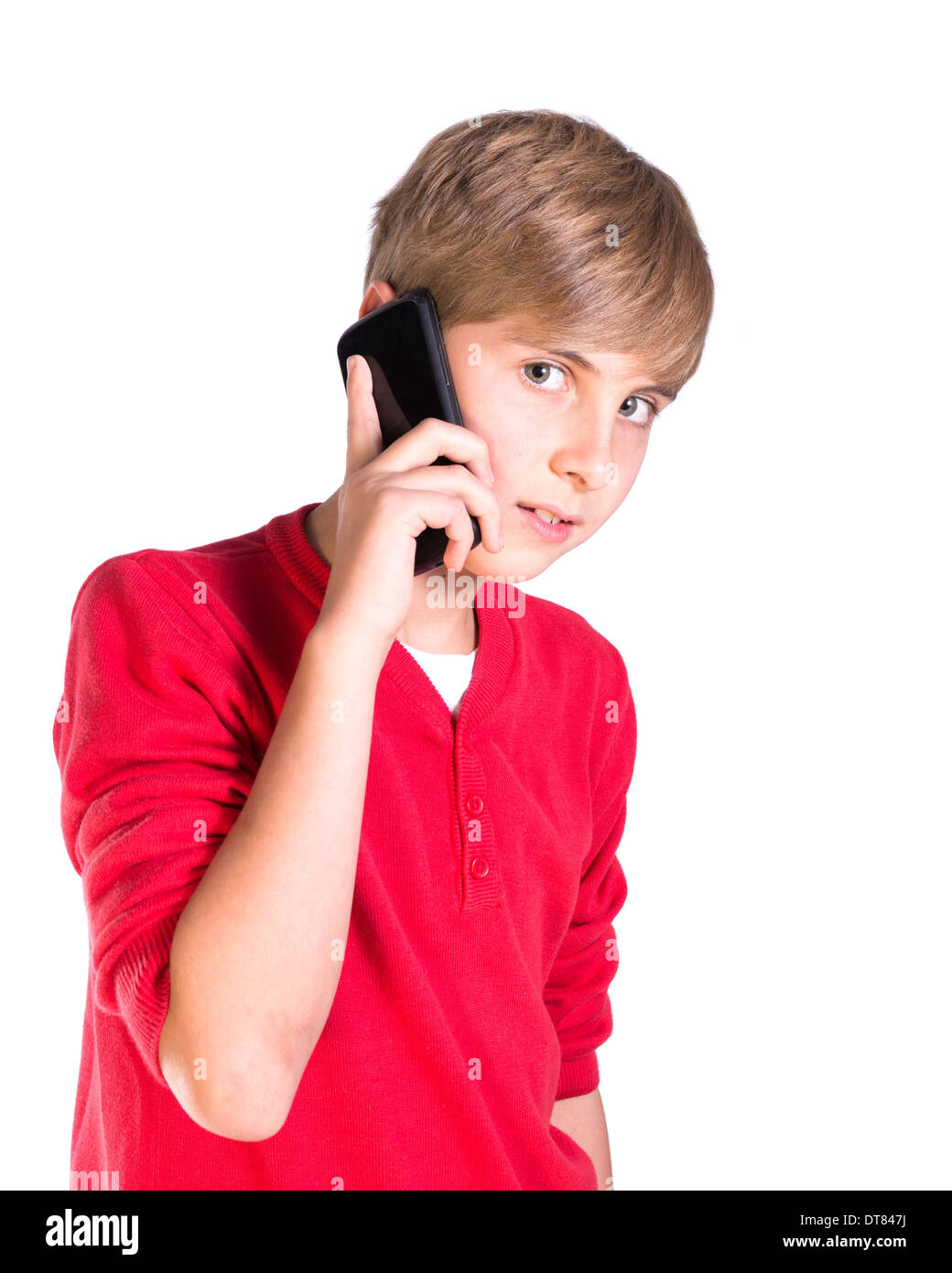 pre teen caucasian boy making call on mobile telephone Stock Photo - Alamy