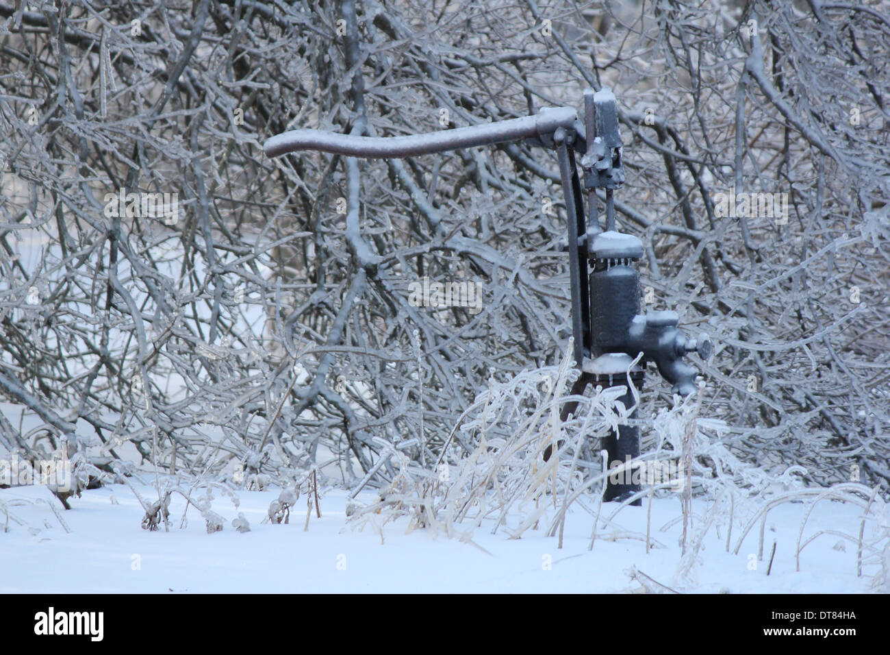 Ice and snow covering an ancient deep well water pump Stock Photo - Alamy