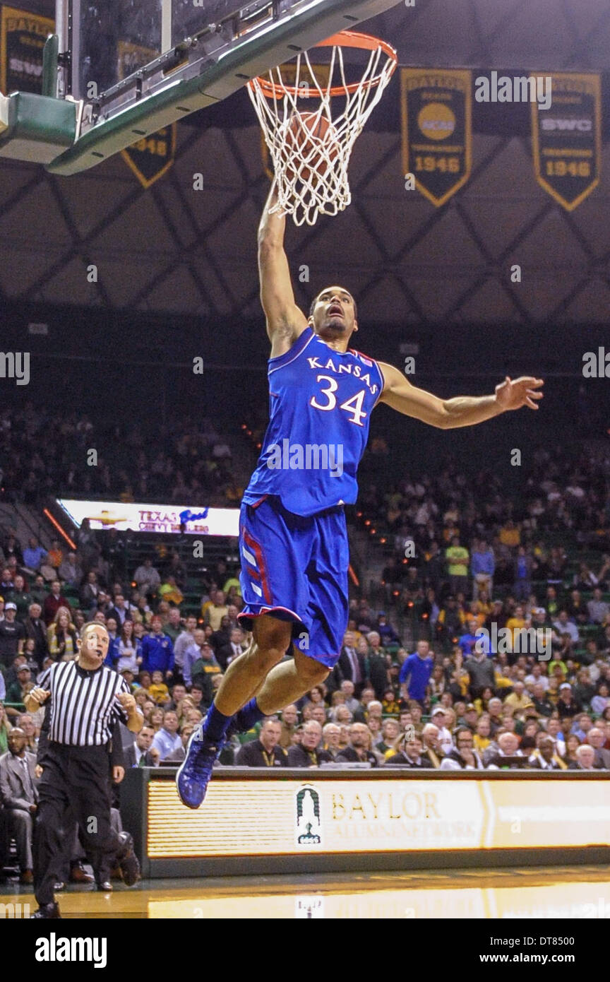 Kansas Jayhawks forward Perry Ellis (34) goes up for a dunk.in an NCAA ...