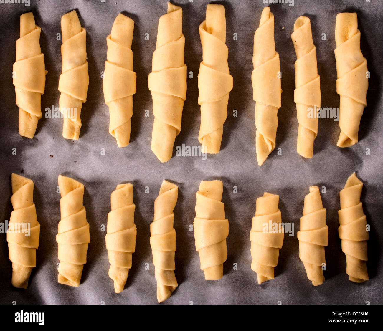 Group of mini croissants prepared for baking,from above Stock Photo - Alamy