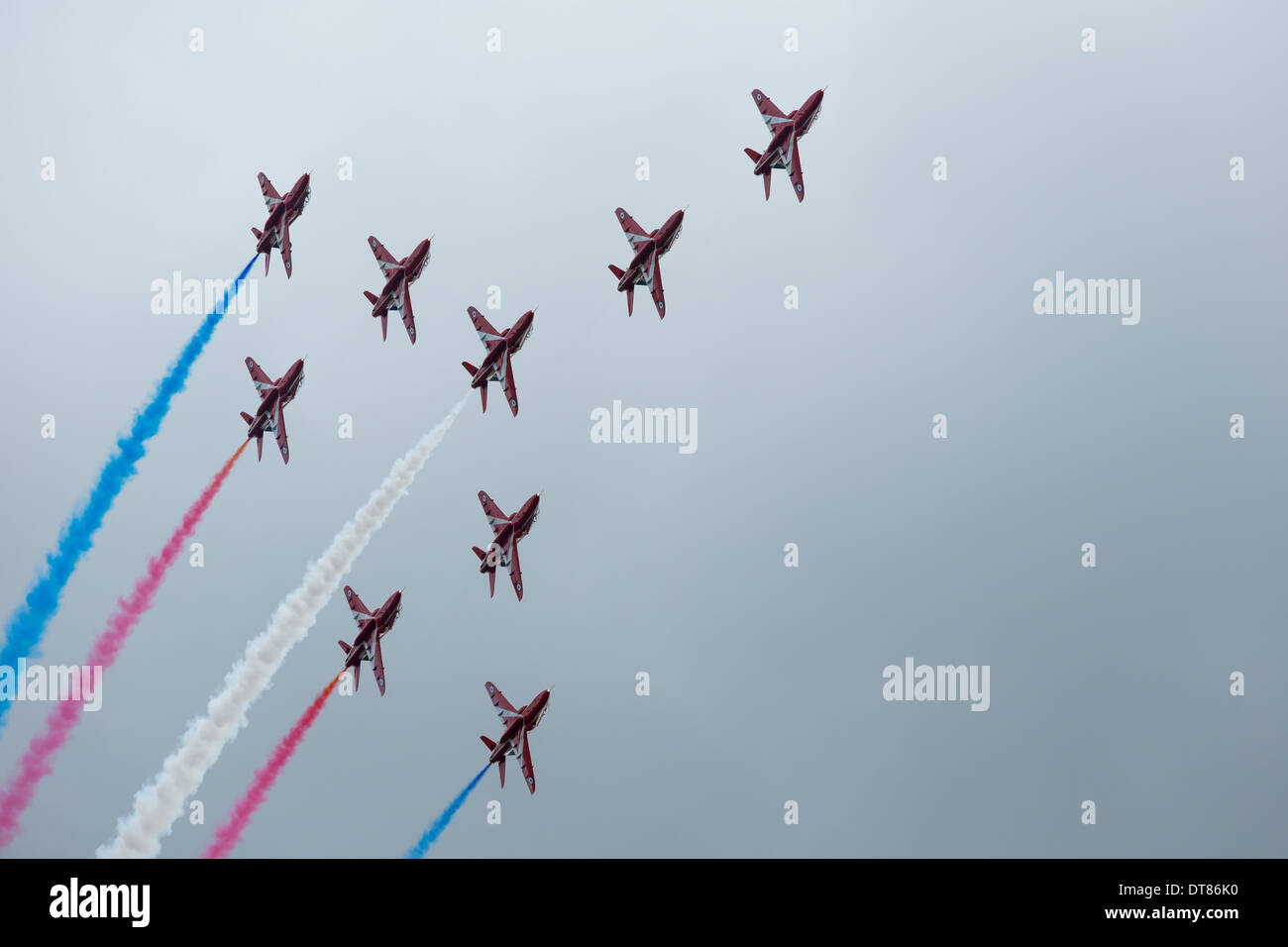 Red Arrows display team flying in formation Stock Photo - Alamy