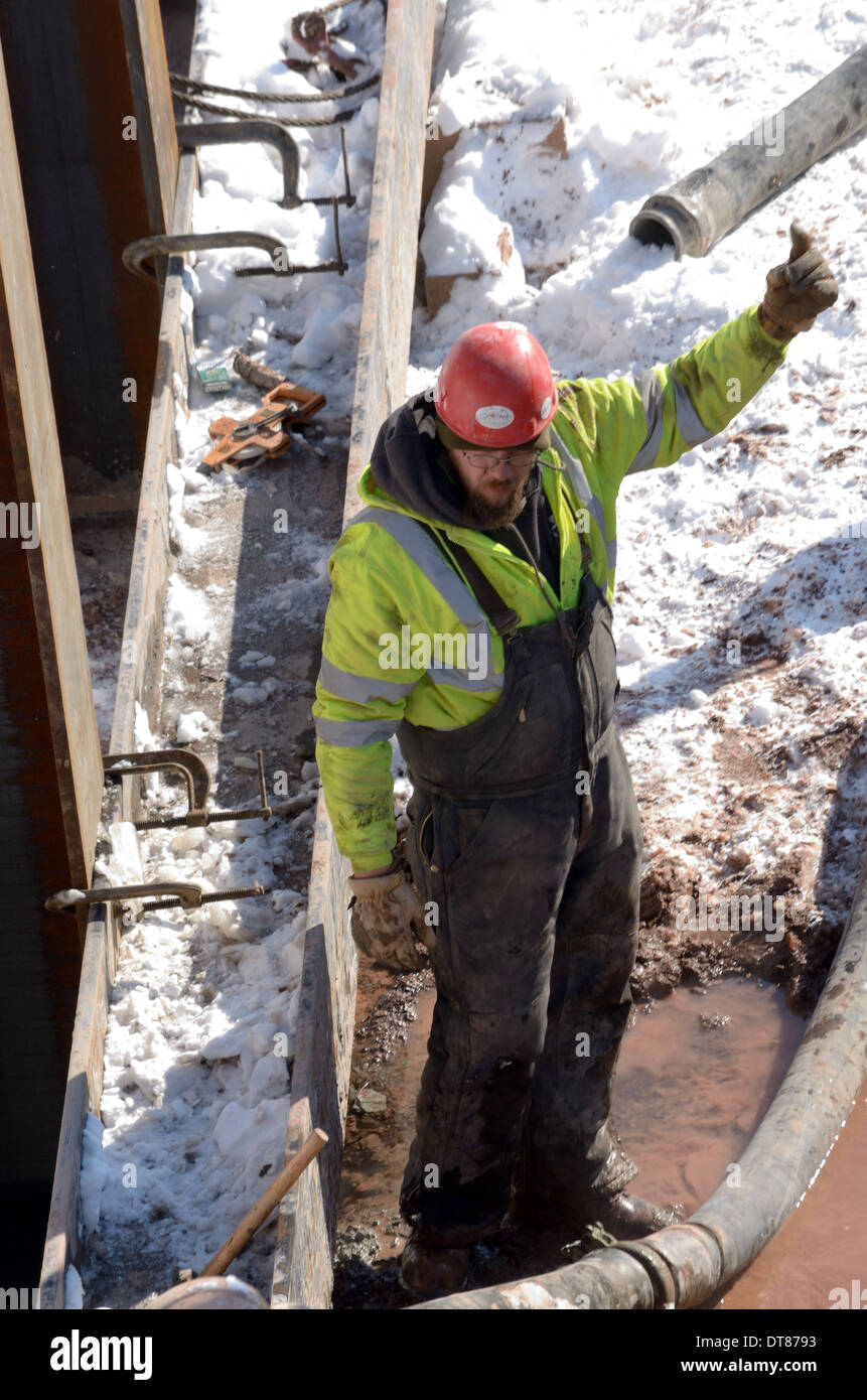 Man signal cement truck to continue flow of cement to Erie Canal ...