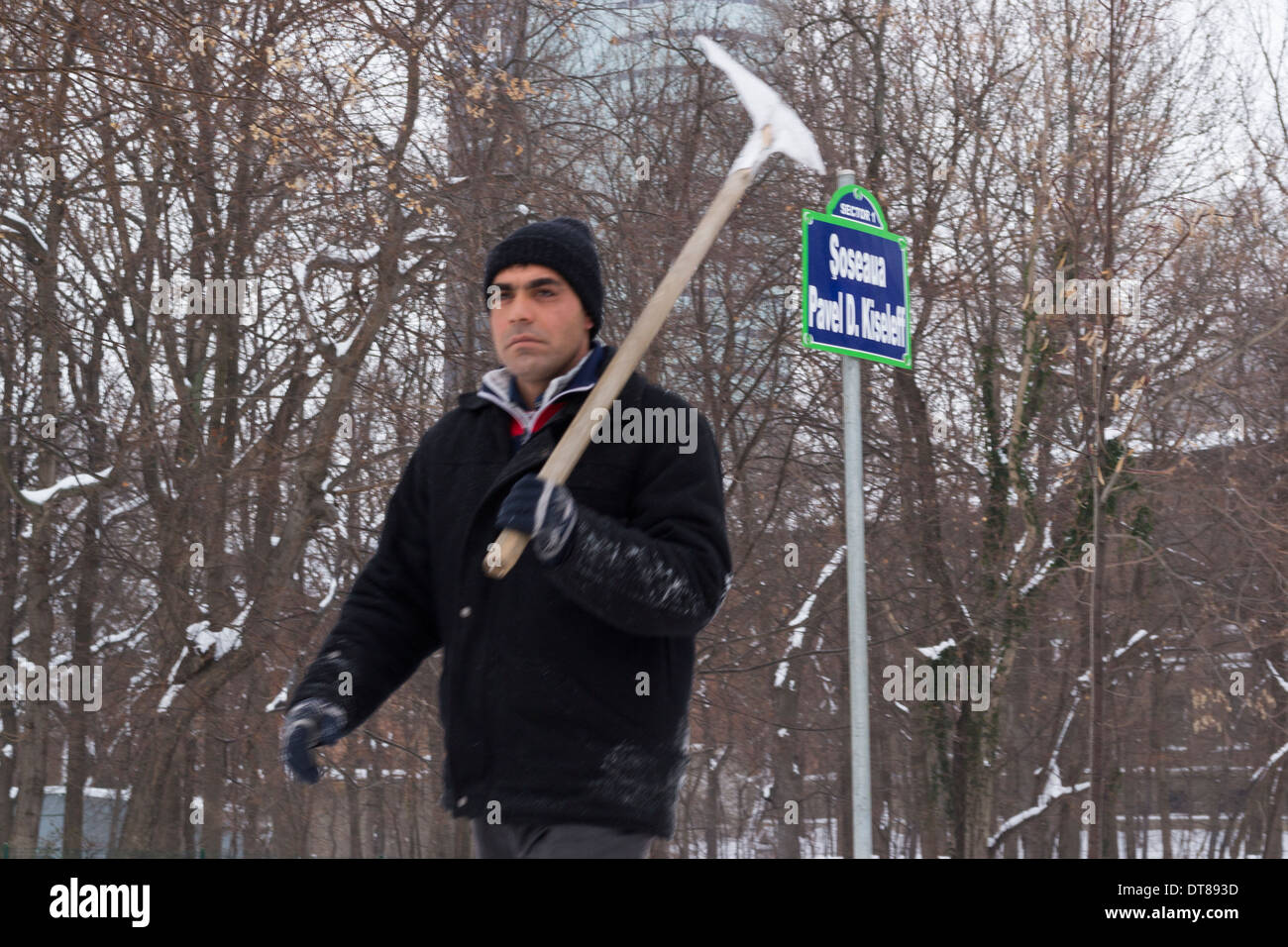 Man shoveling snow hi-res stock photography and images - Alamy