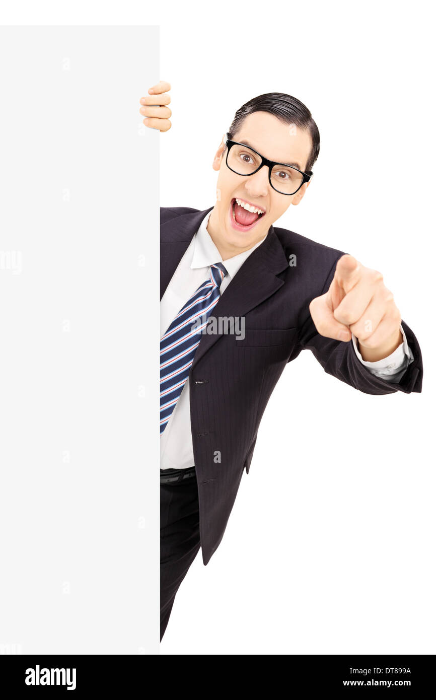 Young man behind whiteboard pointing hi-res stock photography and ...
