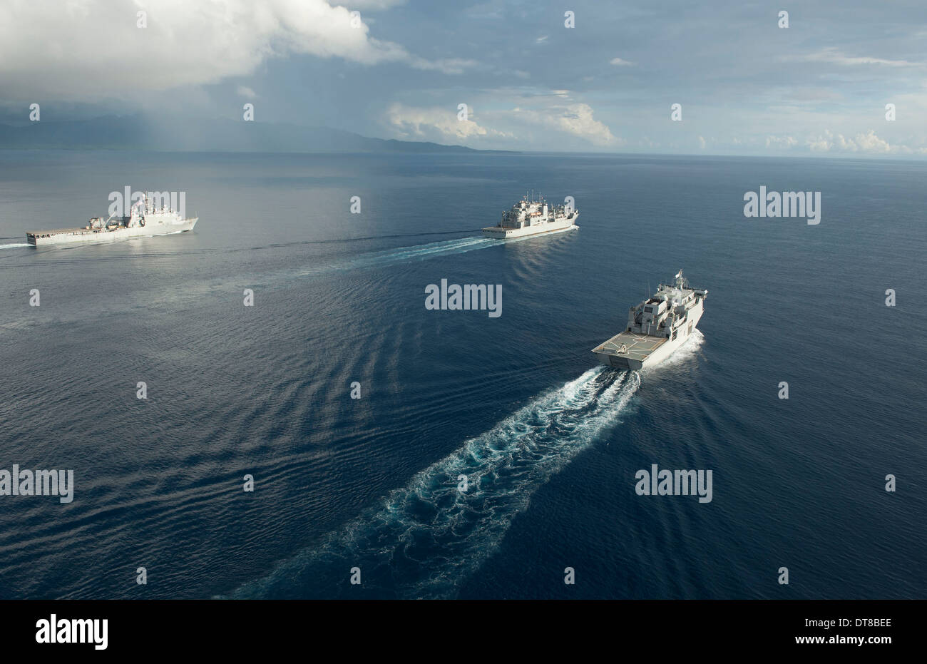 USNS Matthew Perry, USS Pearl Harbor and HMNZS Canterbury transit the ...