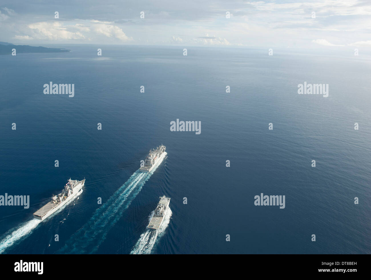 USNS Matthew Perry, USS Pearl Harbor and HMNZS Canterbury transit the ...