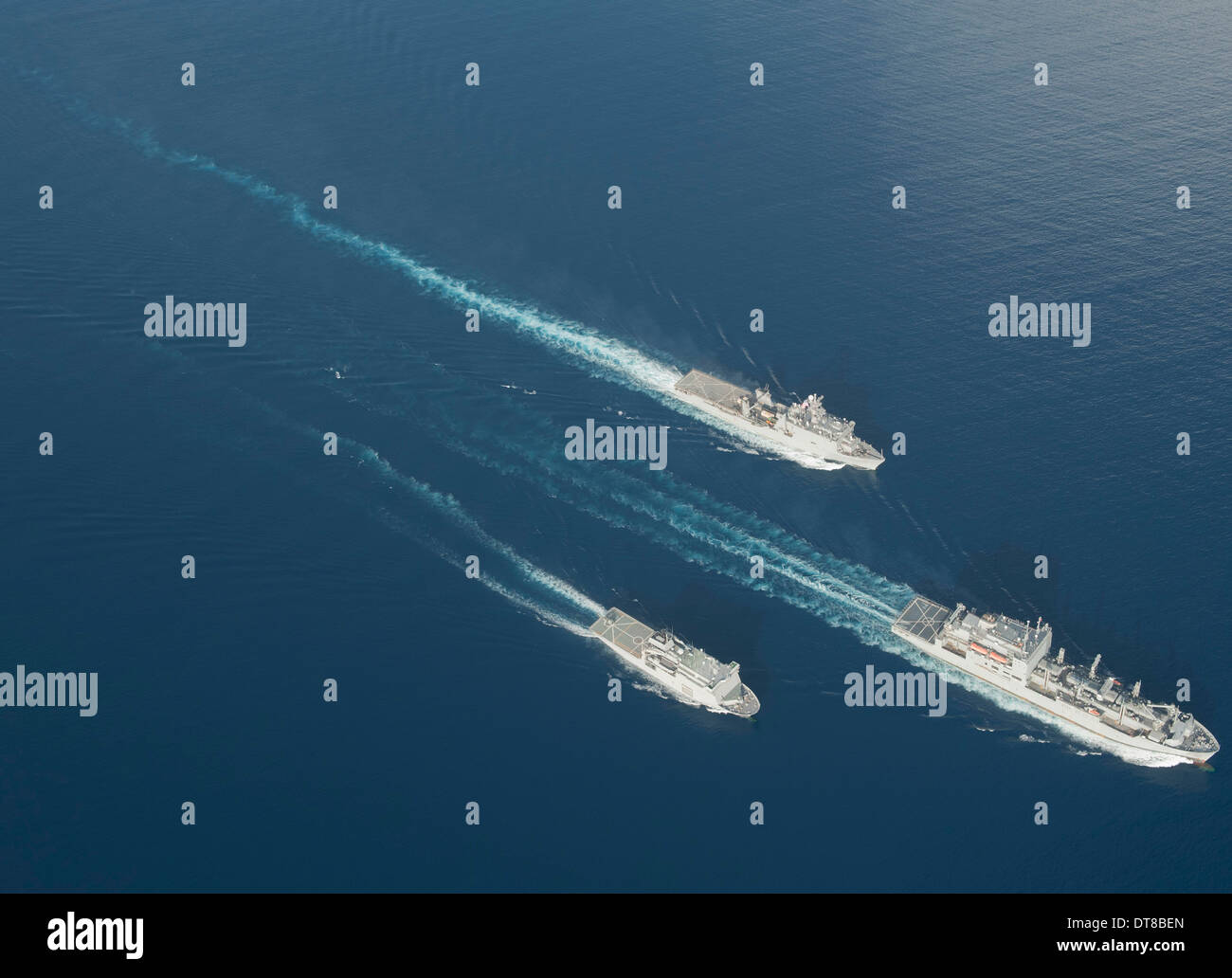 USNS Matthew Perry, USS Pearl Harbor and HMNZS Canterbury transit the ...