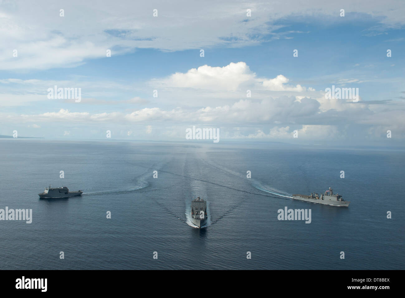 USNS Matthew Perry, USS Pearl Harbor and HMNZS Canterbury transit the ...