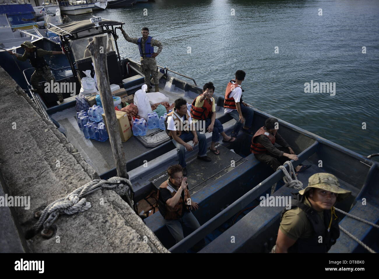 Colon, Panama. 11th Feb, 2014. Crew members of the vessel Chong Chon ...