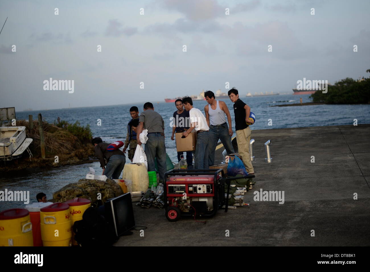 Colon, Panama. 11th Feb, 2014. Crew members of the vessel Chong Chon ...