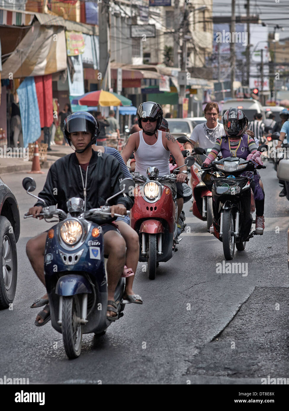 Traffic Thailand. Street scene and motorcycle traffic. Thailand S. E ...