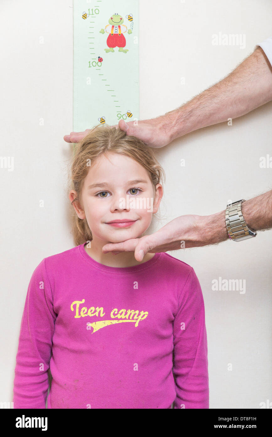 Height measure girl hi-res stock photography and images - Alamy