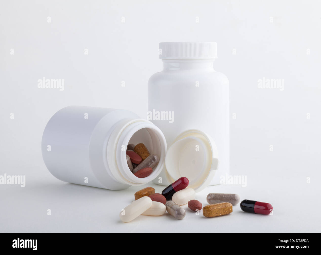 Supplementary food medicine tablets and bottle isolated on white ...