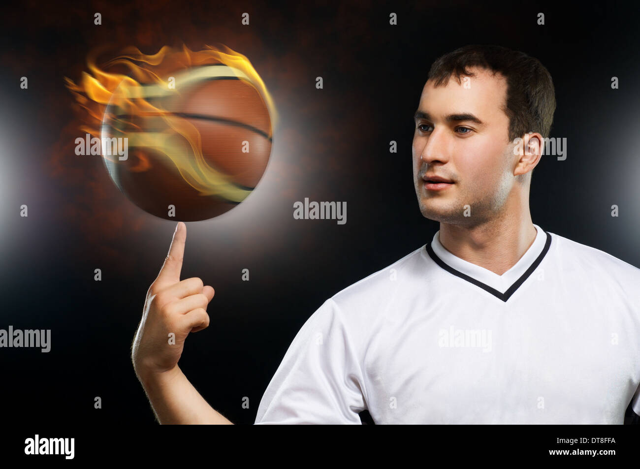 man spinning basketball on finger Stock Photo - Alamy