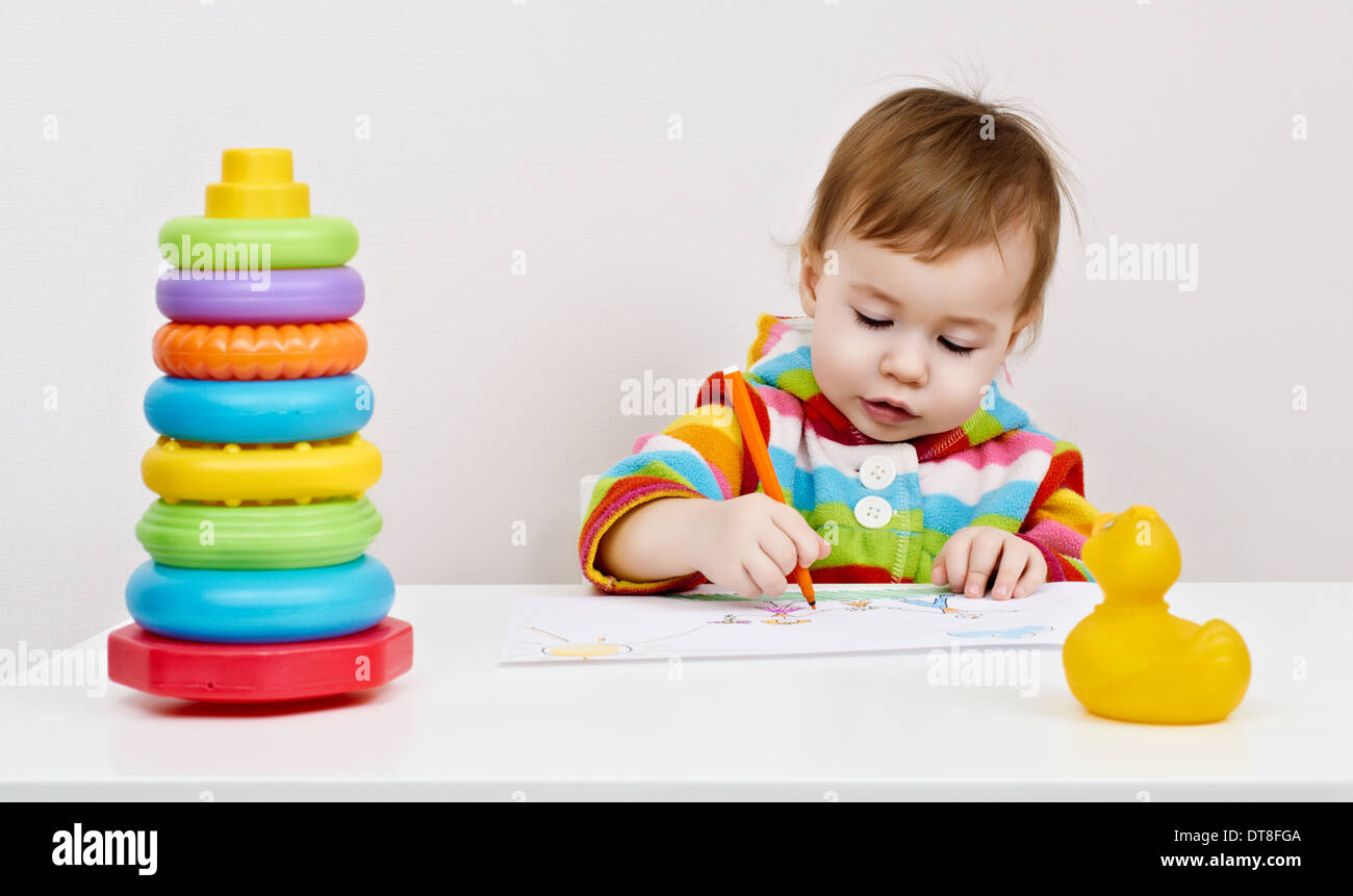 little child playing with with toys Stock Photo - Alamy