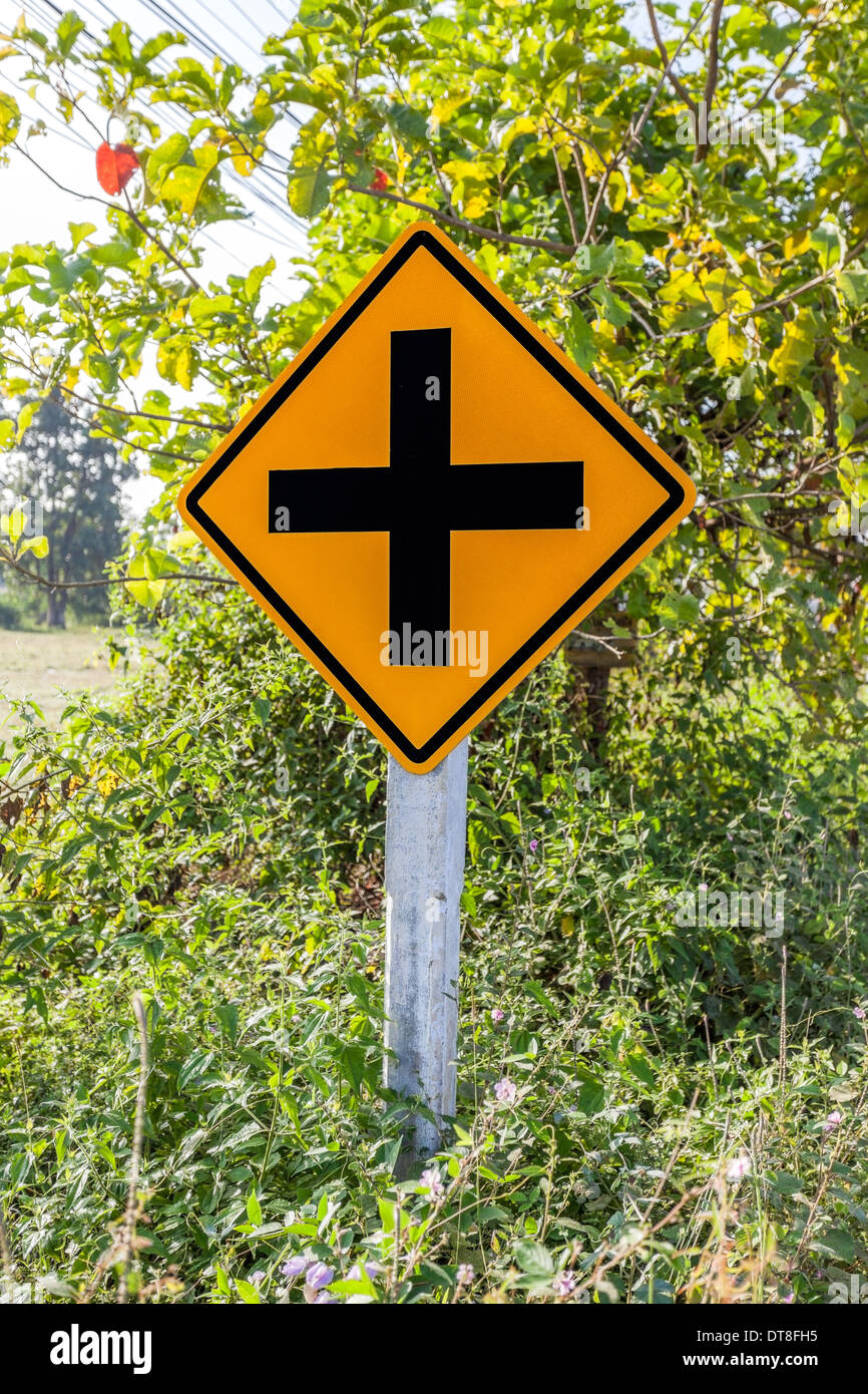 an sign whit an intersection near by Stock Photo - Alamy