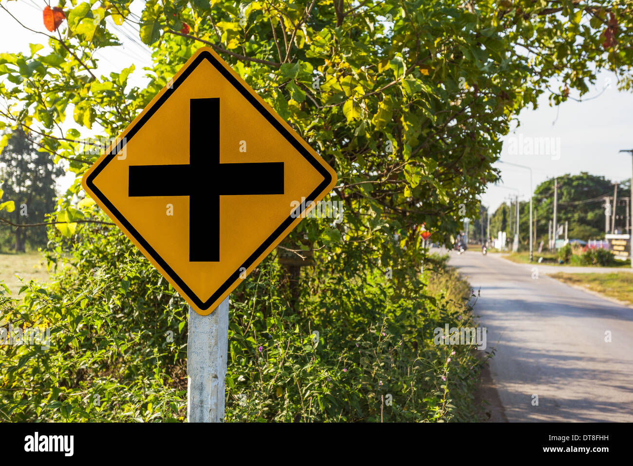 an sign whit an intersection near by Stock Photo - Alamy