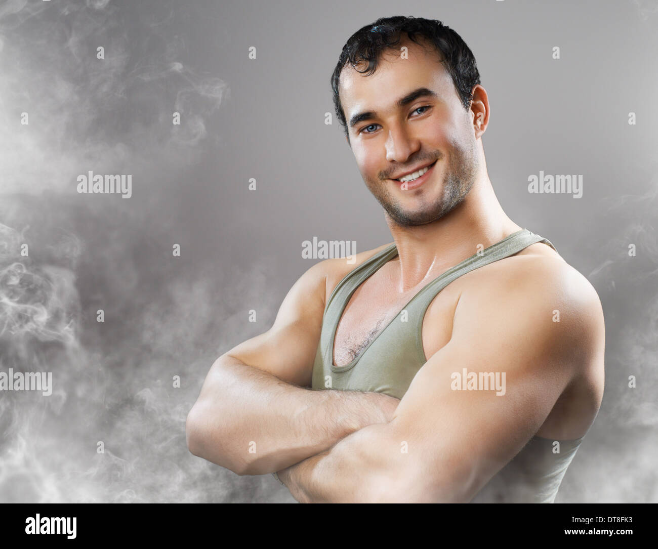 a beauty man on the grey background Stock Photo - Alamy