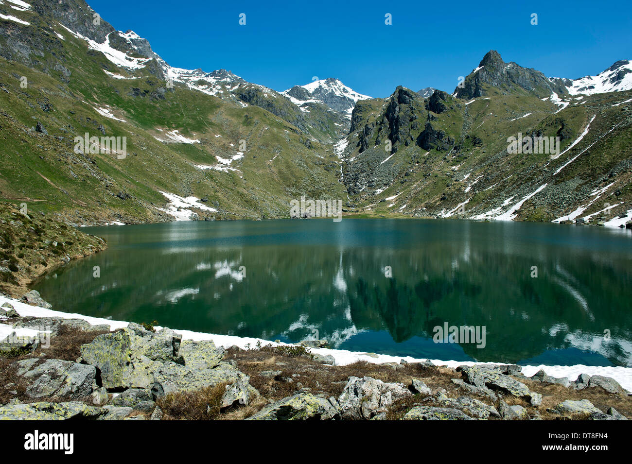 At the mountain lake Louvie, peak Becca d'Agè behind, to the right ...