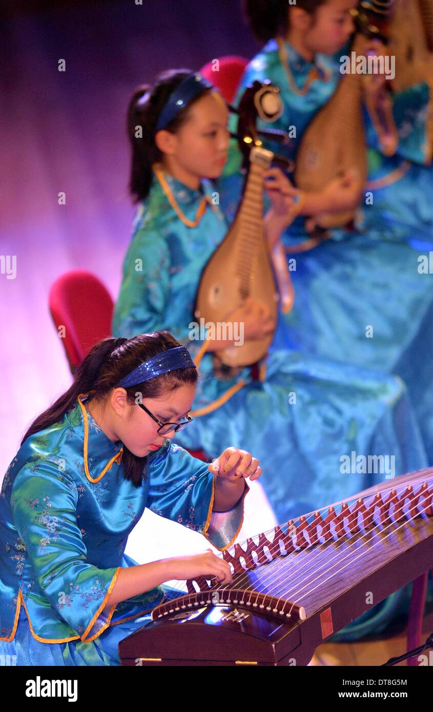 Paris, France. 11th Feb, 2014. Chinese students play traditional ...