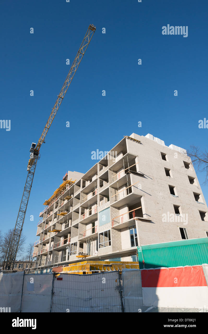 Construction site. Crane over building Stock Photo - Alamy