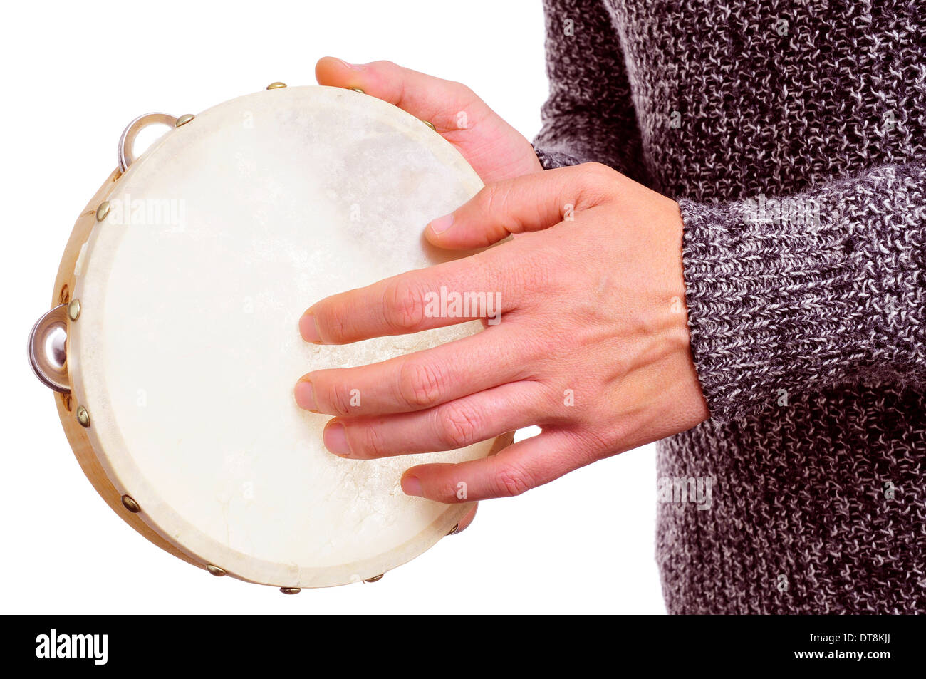 someone playing a tambourine over a white background Stock Photo - Alamy