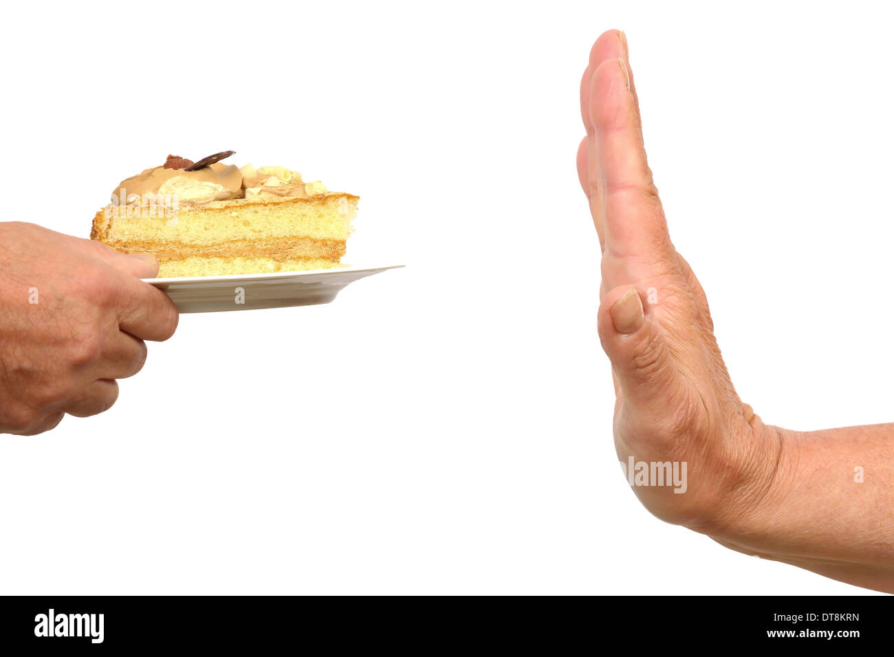 Hand gesturing no to a piece of cake Stock Photo - Alamy