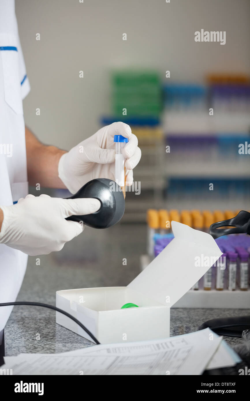 Technician Scanning Barcode On Medical Sample Stock Photo - Alamy