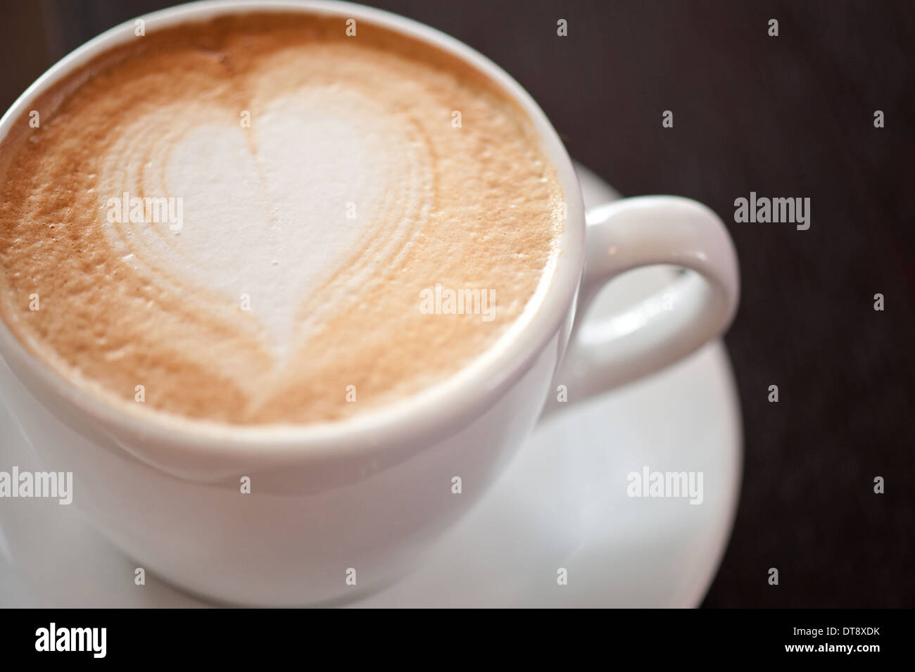 Coffee heart shape Stock Photo - Alamy