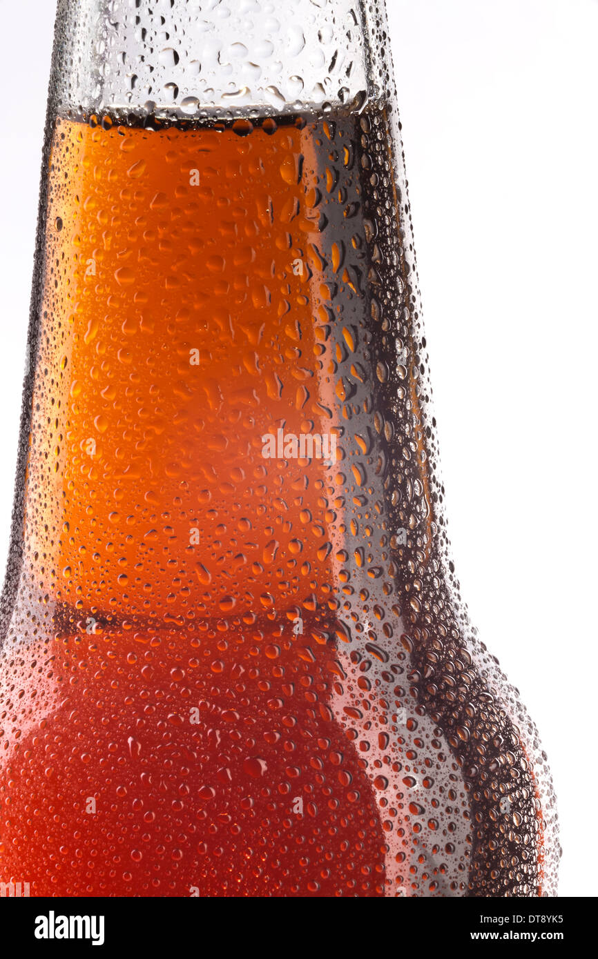 Bottle of beer with droplets close-up Stock Photo - Alamy