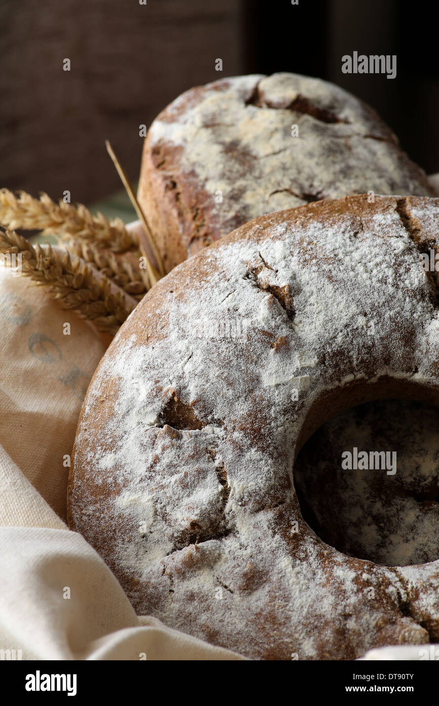 Traditional country style wheat rye wholemeal bread in canvas tote with ...