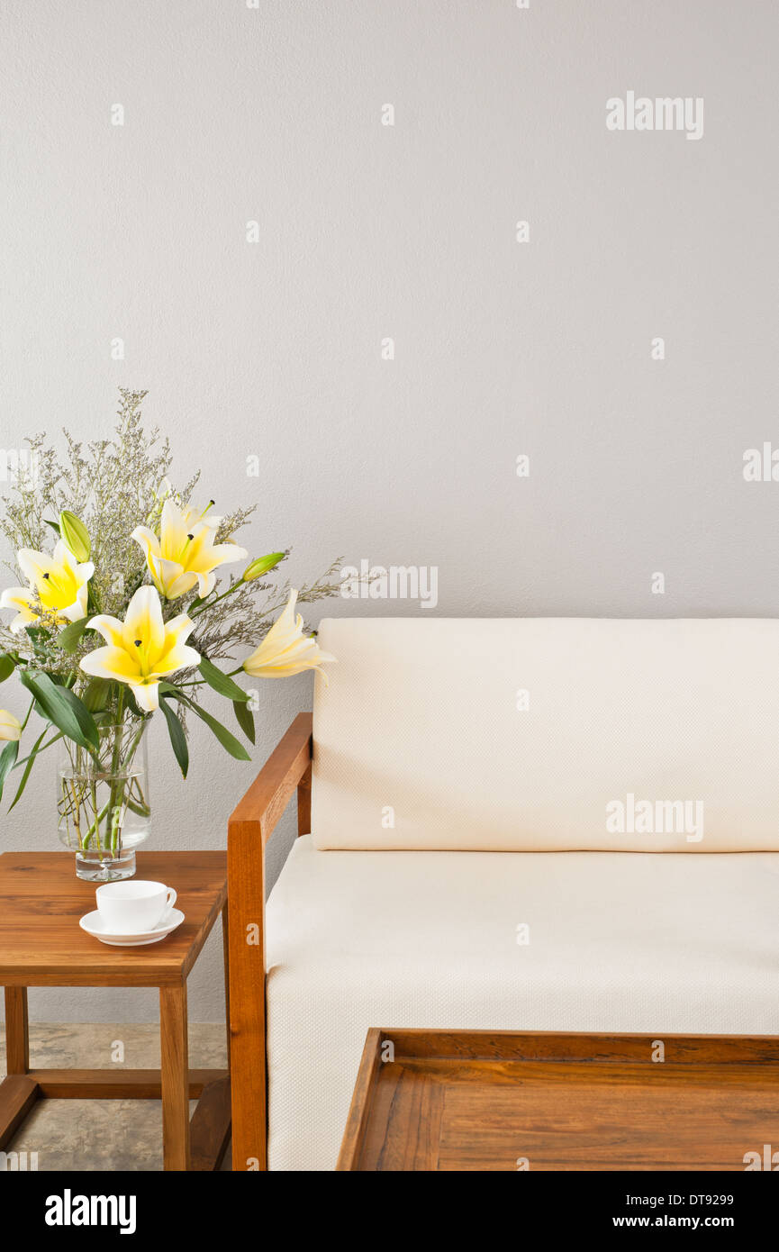 Bright white seater in lounge area Stock Photo - Alamy