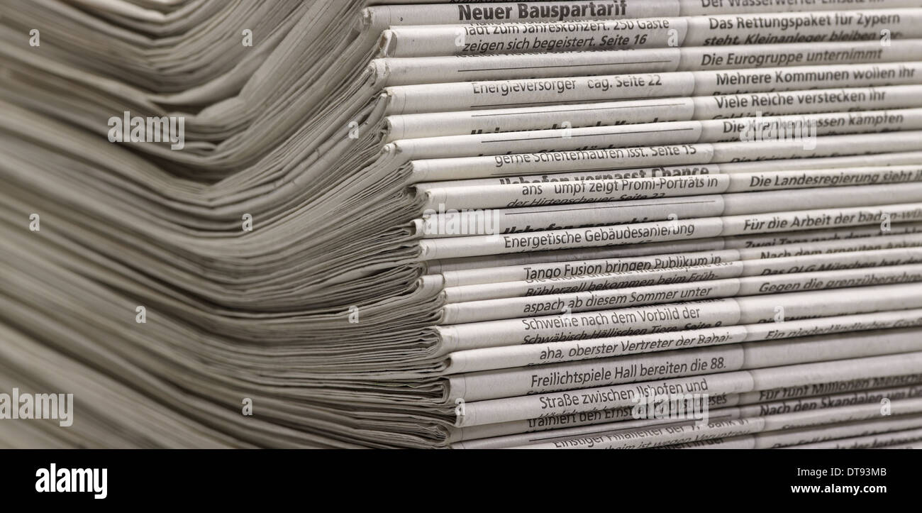full frame background with lots of stacked newspapers Stock Photo - Alamy