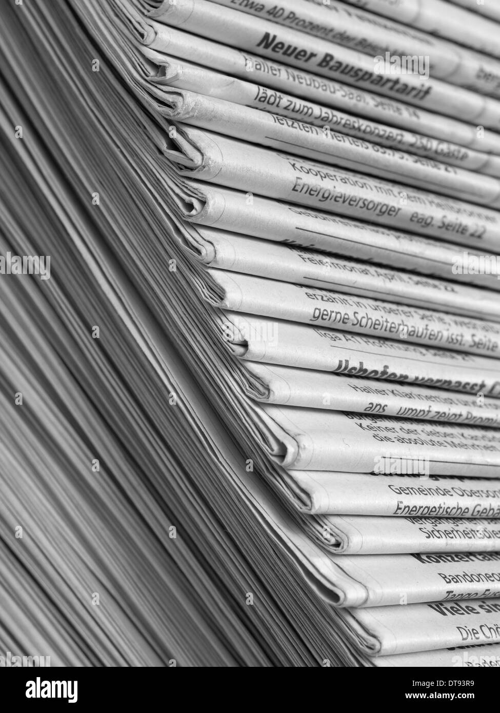 full frame background with lots of stacked newspapers Stock Photo - Alamy