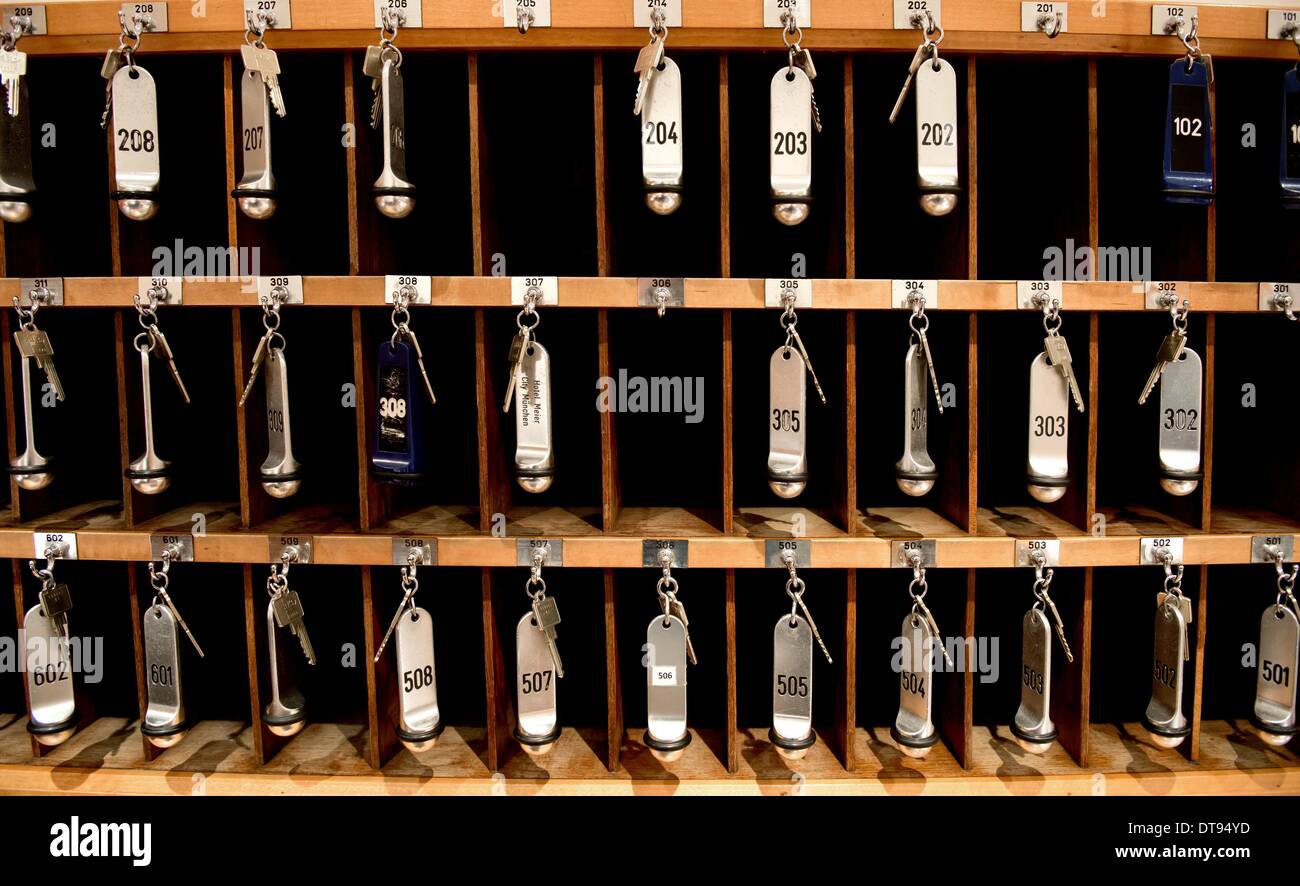 Munich, Germany. 10th Feb, 2014. Room keys hang at a board at the hotel ...