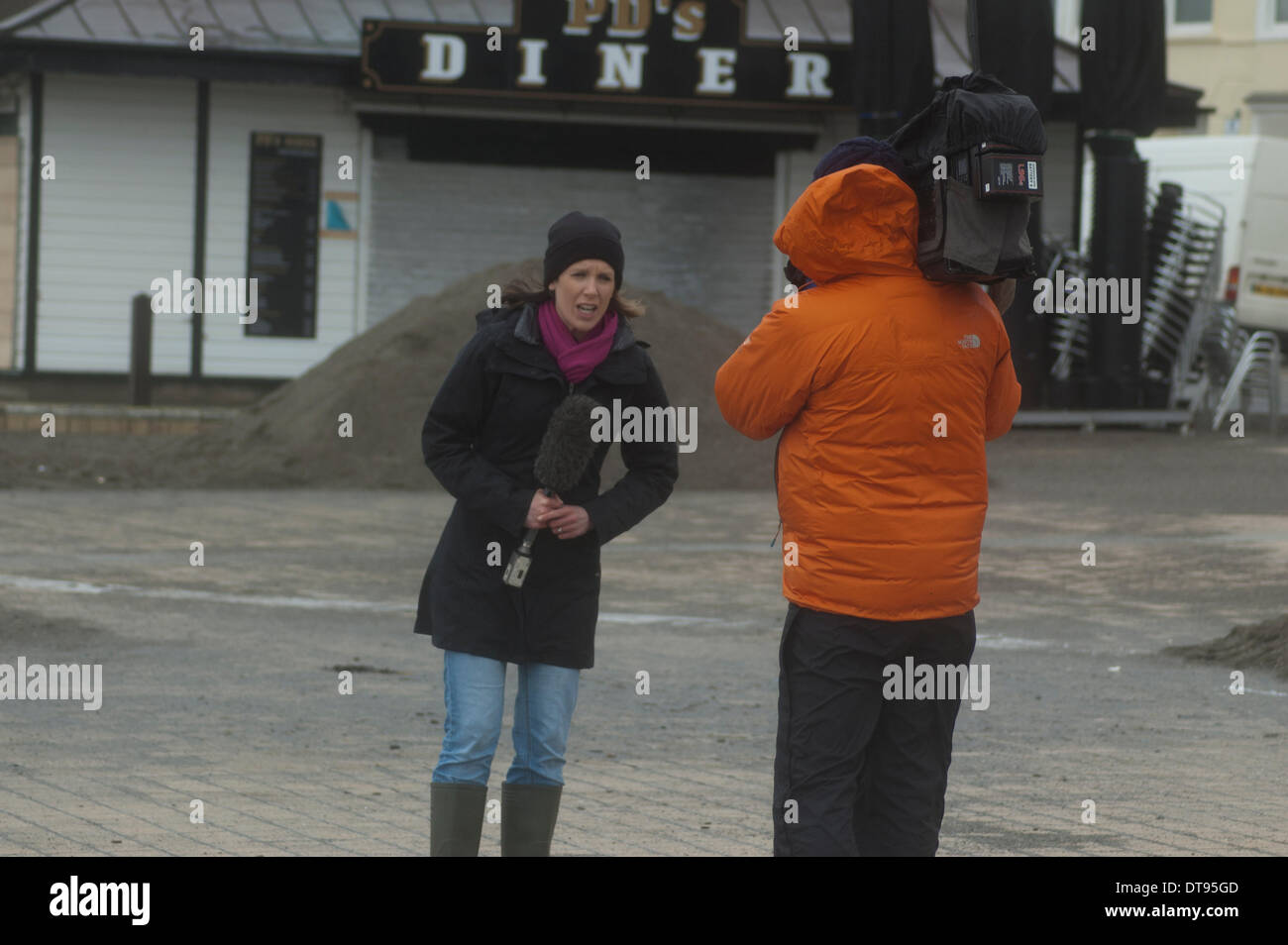 Sky News's reporter Becky Johnson getting buffeted by the high winds ...