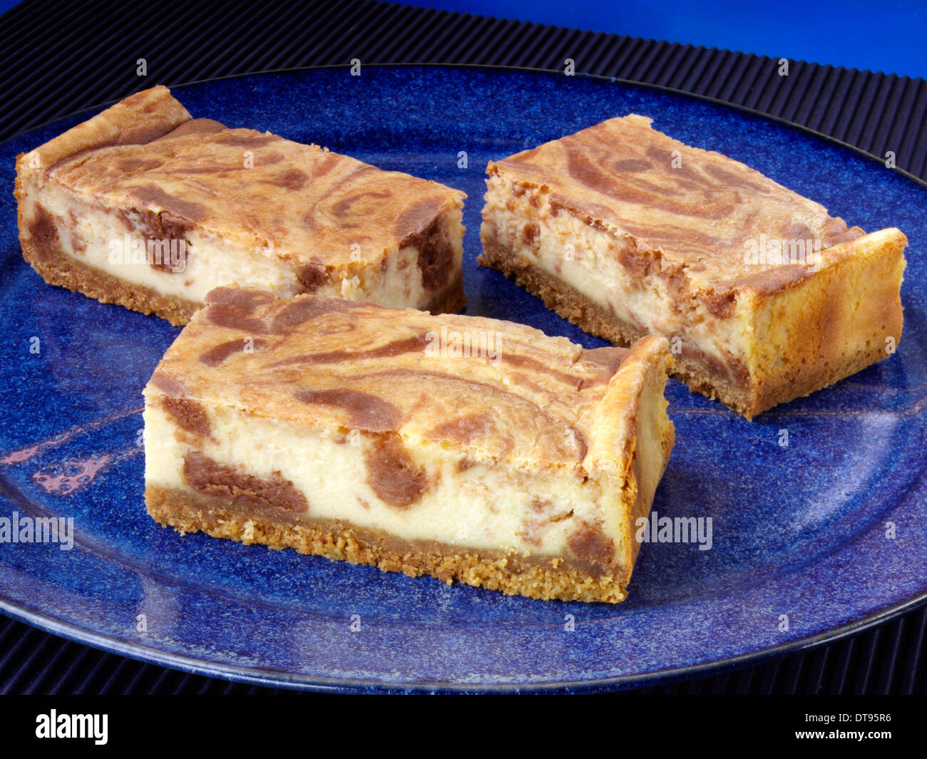 Peanut butter chocolate cheesecake slice Stock Photo - Alamy