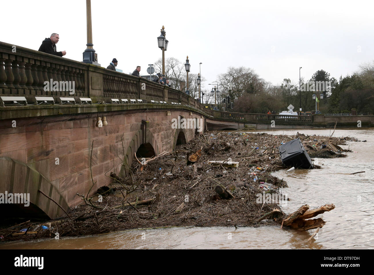 Worcester, UK. 12th Feb, 2014. Huge amounts of debris block the arches ...
