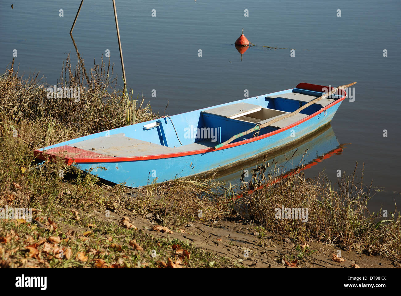 Boat on a river Stock Photo - Alamy