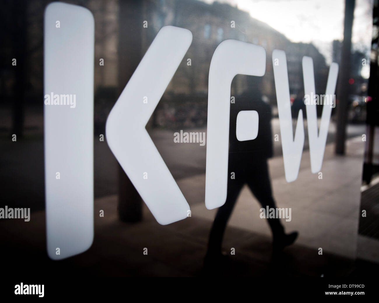 Frankfurt Main, Germany. 12th Feb, 2014. A passerby walks past the ...