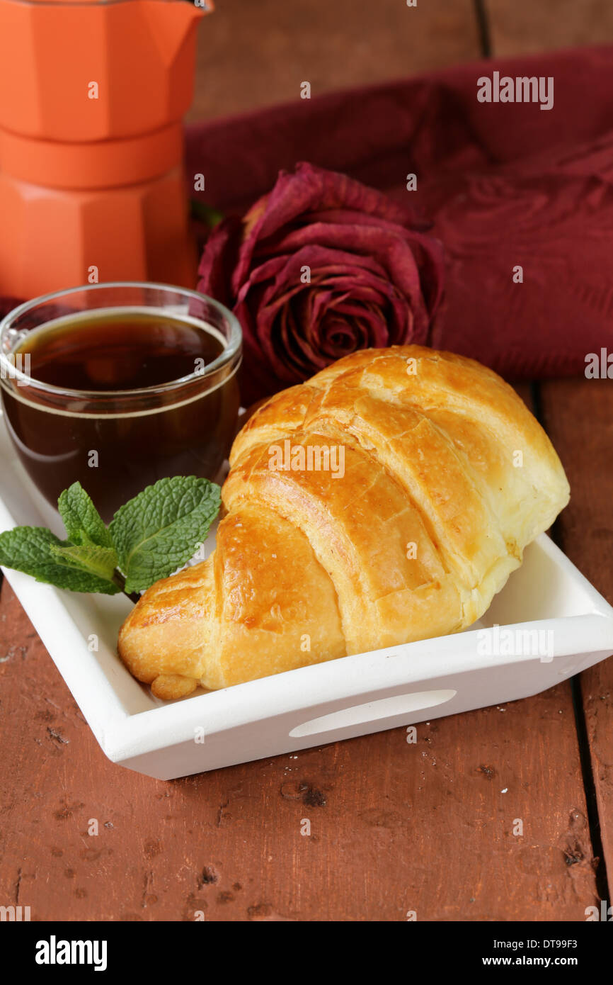 elegant coffee break or breakfast cup of coffee and croissant Stock ...