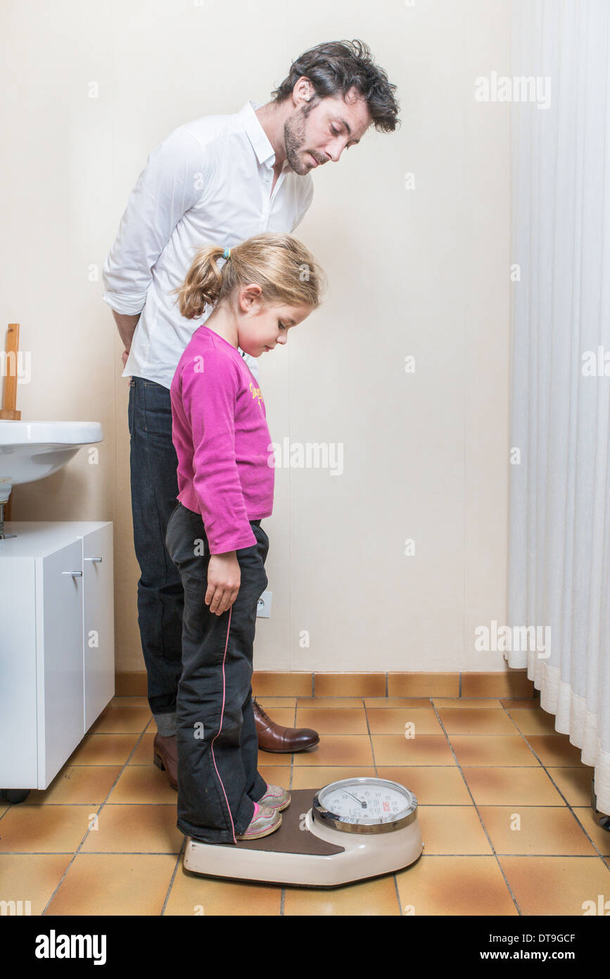 Child weight scale hi-res stock photography and images - Alamy