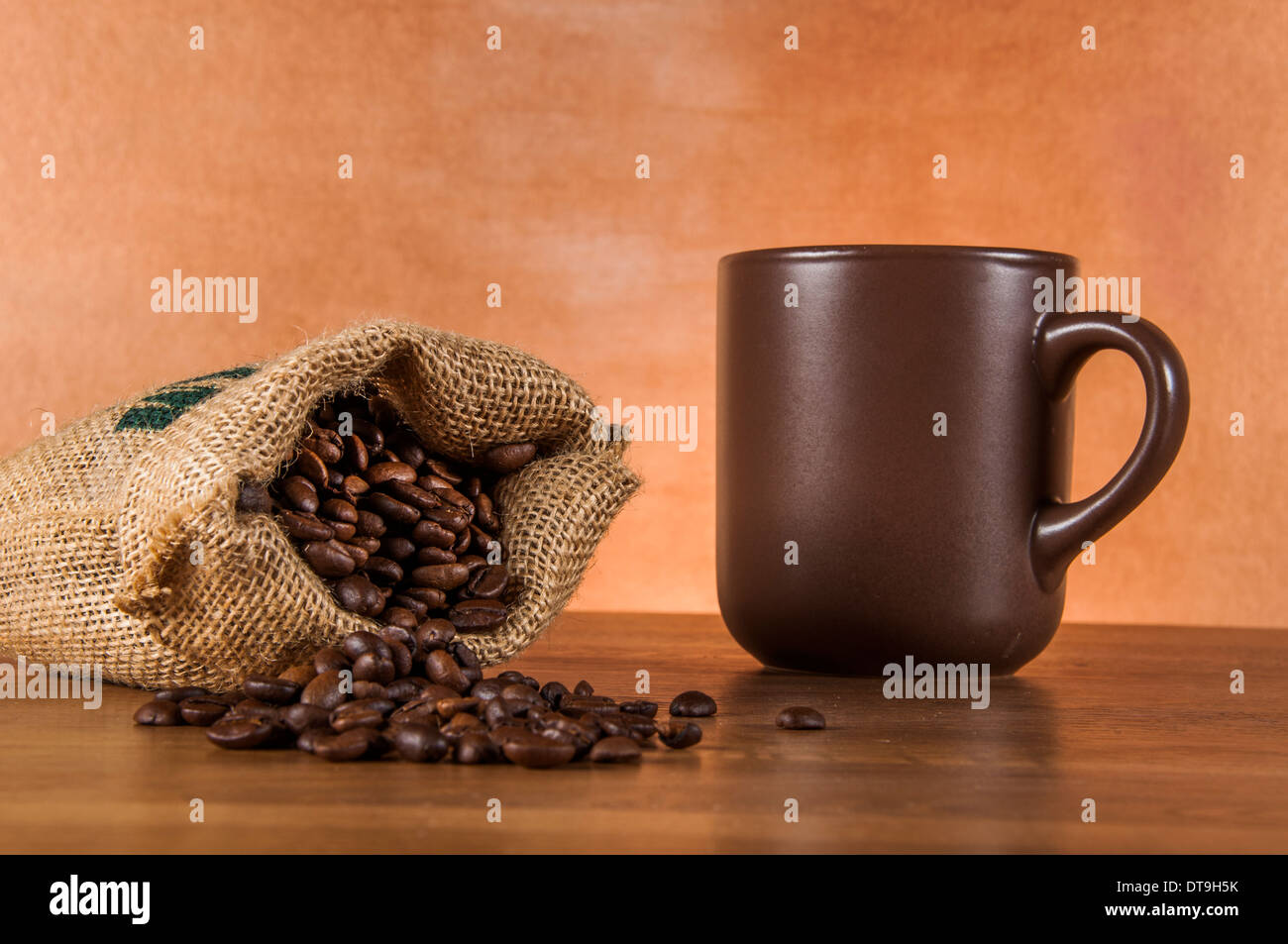 Coffee theme with wooden table and dark background Stock Photo - Alamy