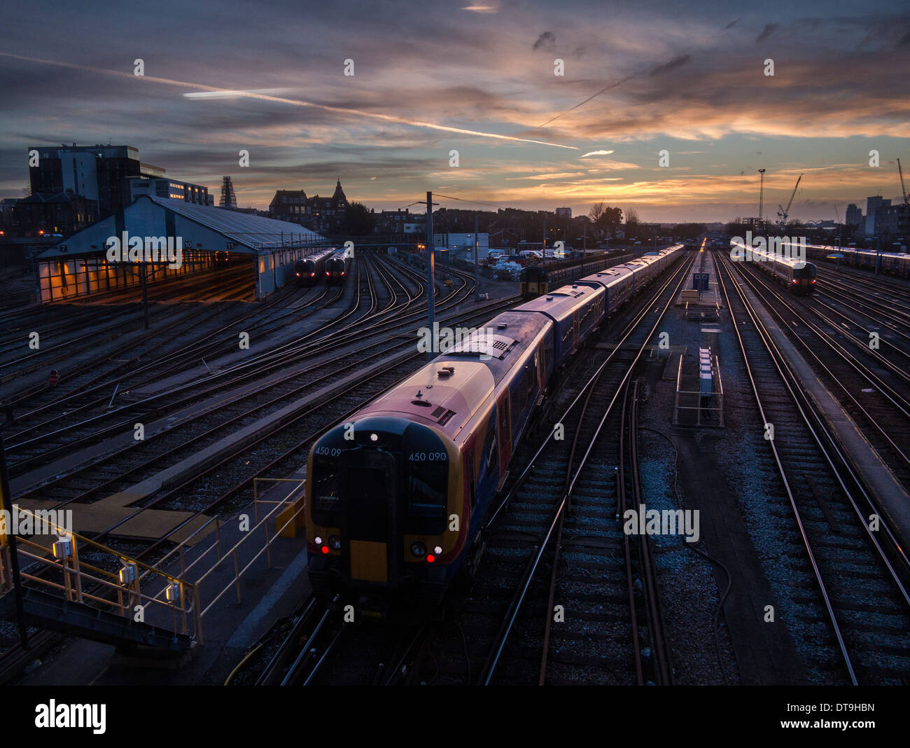 Dusk at Clapham Junction railway station Stock Photo - Alamy