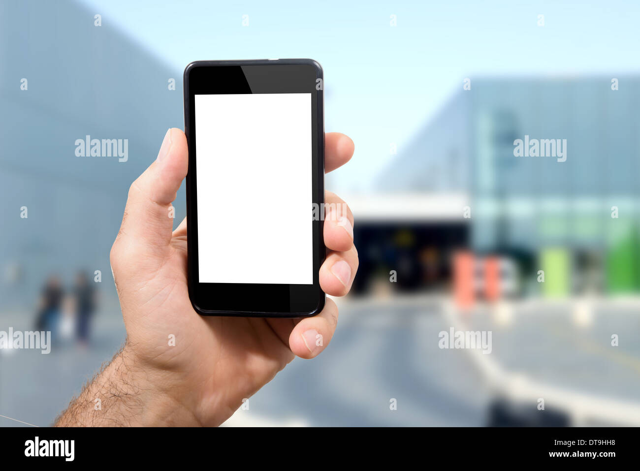 hand of man is in possession of mobile smartphone with touch screen ...