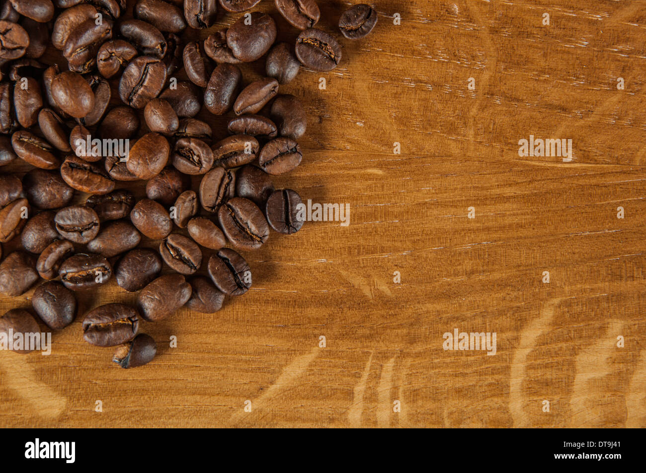 Coffee theme with wooden table and dark background Stock Photo - Alamy