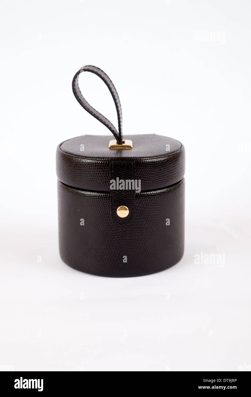 Closed Black Leather Circular Jewellery Box with Handle Stock Photo - Alamy